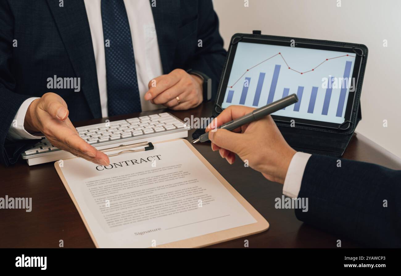 Businessman consulting client in office hi-res stock photography and ...