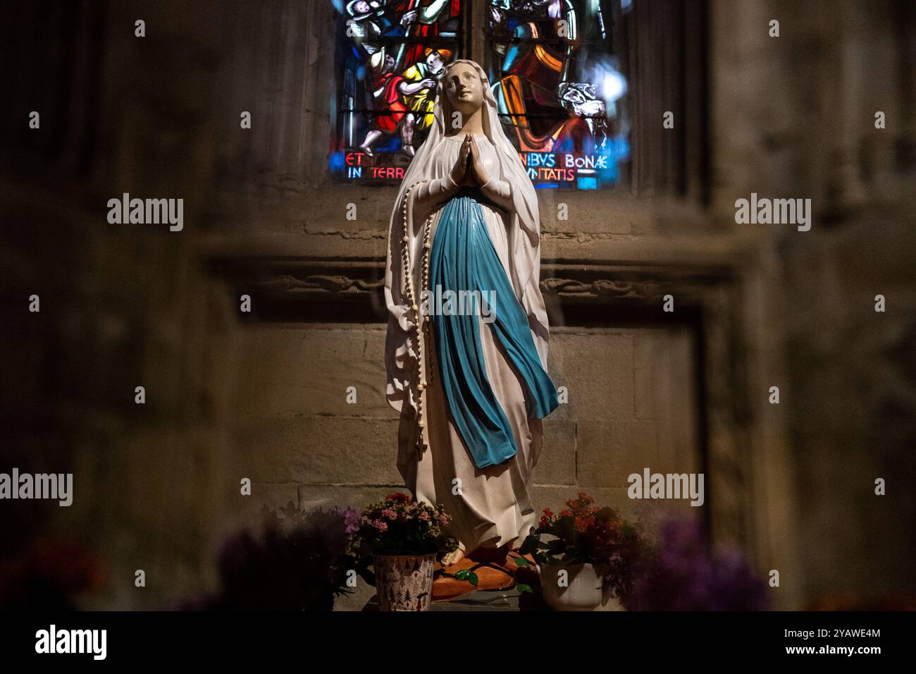 A statue the Blessed Virgin Mary in the Basilica of Saint-Sauveur of ...