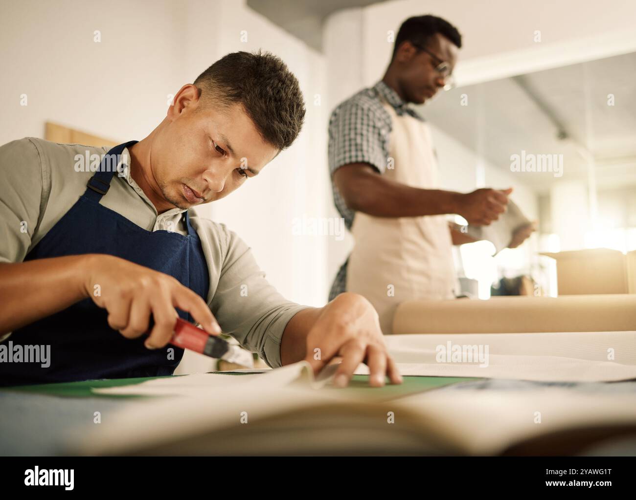 Man, tailor and cutting sample for clothes, textures design and ...