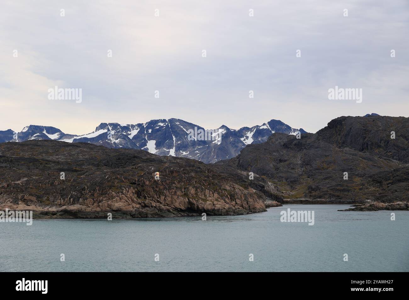 Mountain range in a bay of the Kangerlussuaq fjord Greenland, Denmark ...