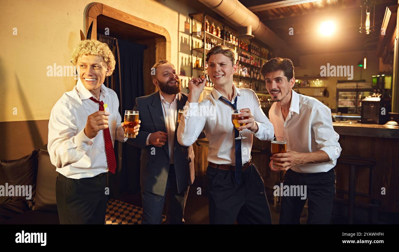 Sitting bar counter friends laughing hi-res stock photography and ...