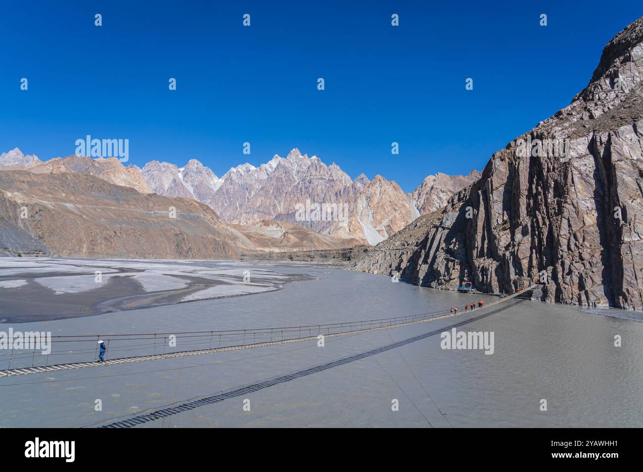 Landscape view of Hussaini suspension bridge above Hunza river with ...