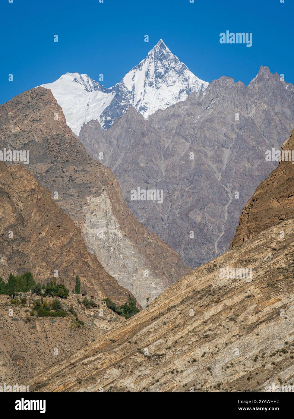 Vertical mountain landscape view of snow-capped Shispare peak aka ...