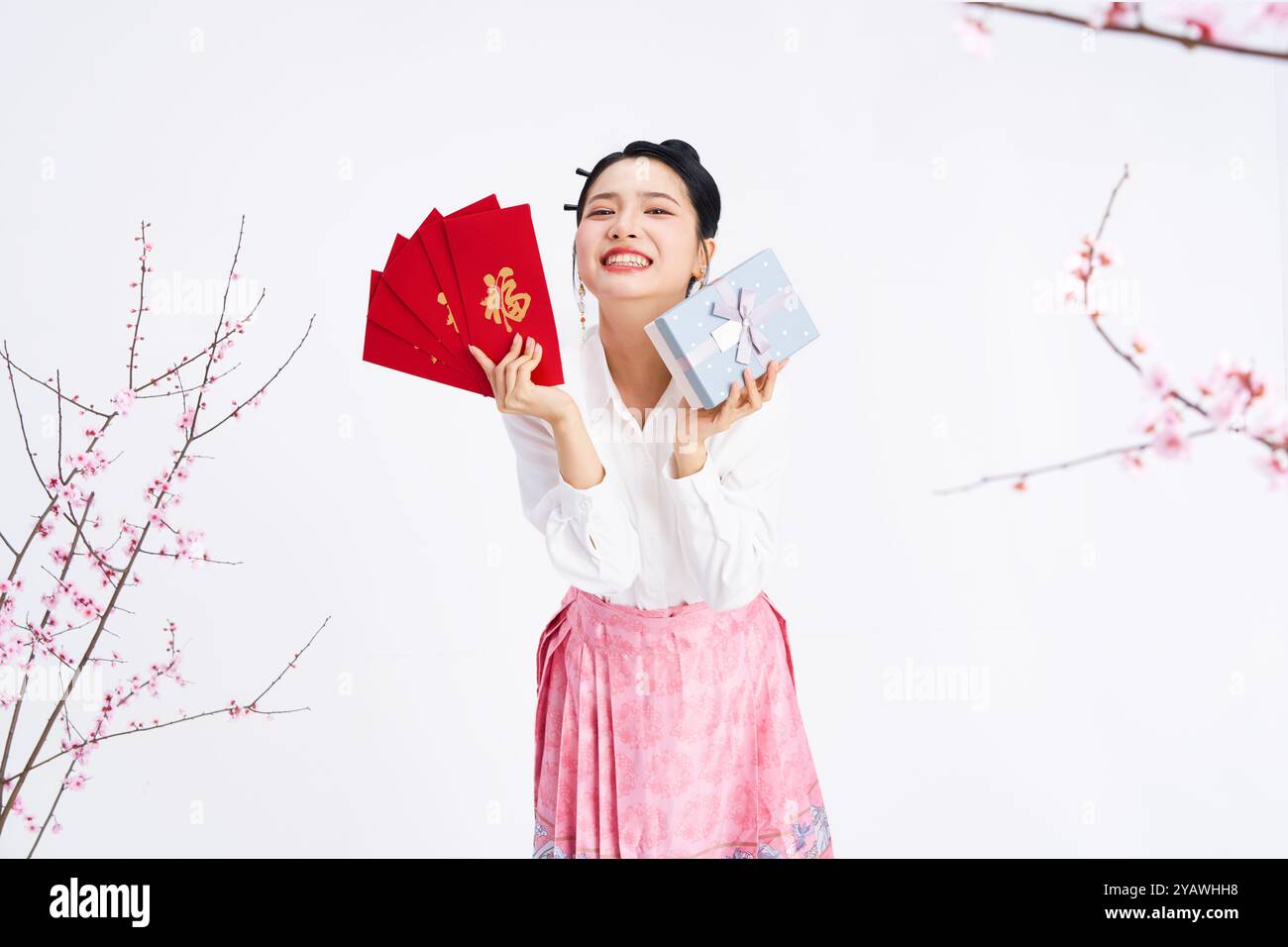 Young woman holding boxes hi-res stock photography and images - Alamy