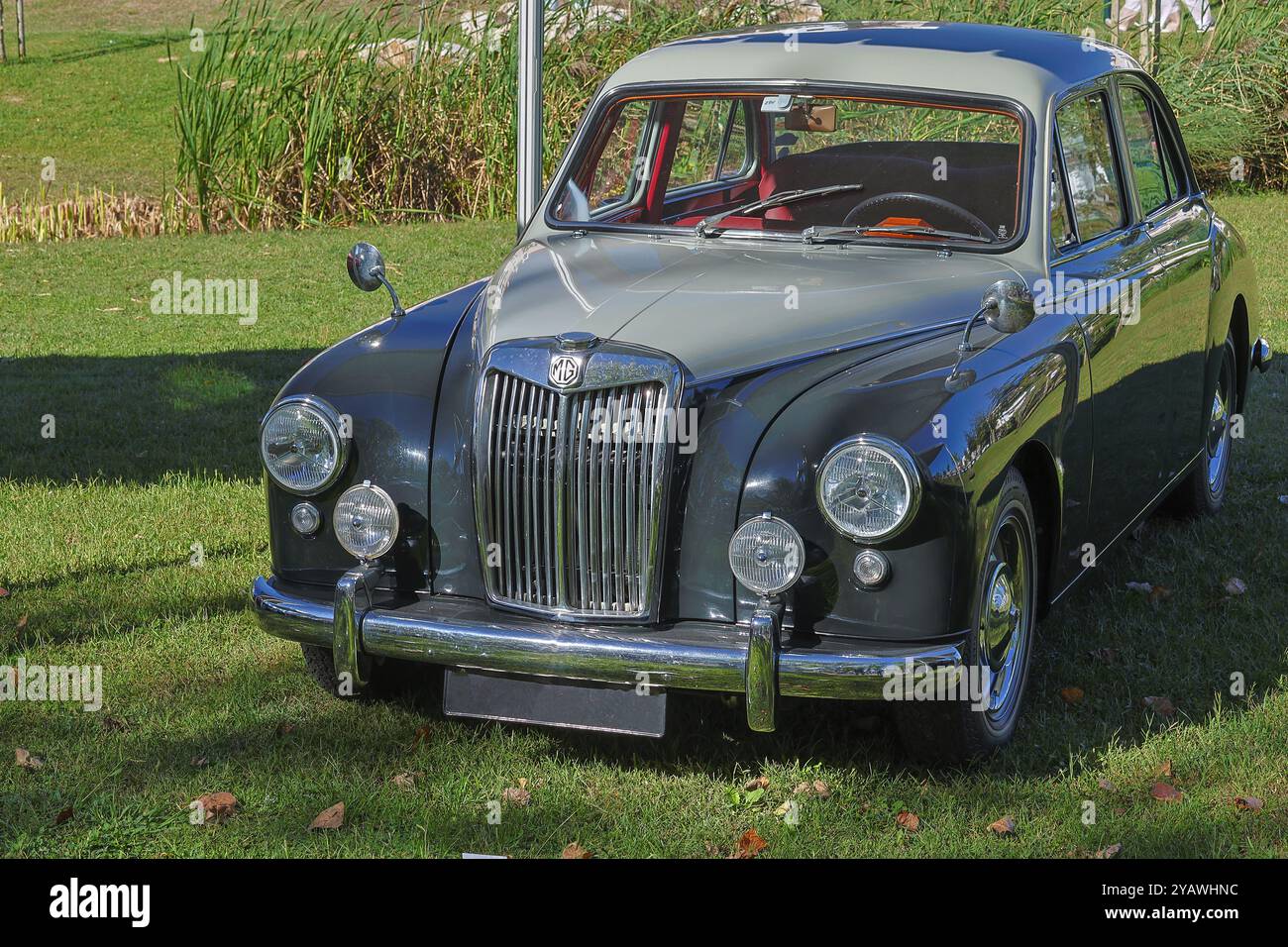 Classic mg magnette za automobile parked on grass in front of a body of ...