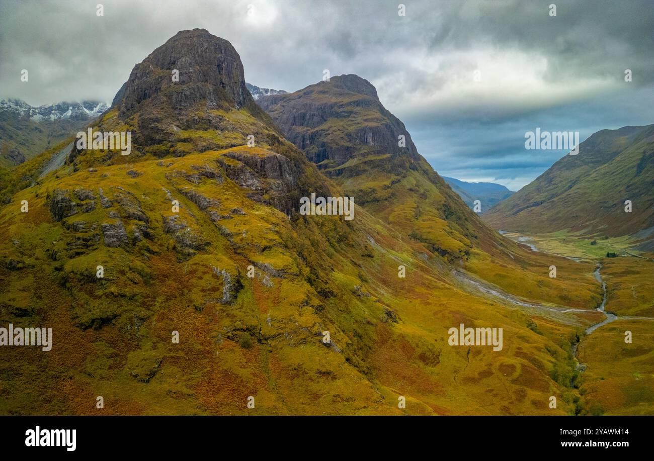 Aerial view from drone of The Three Sisters mountain peaks in Glen Coe ...