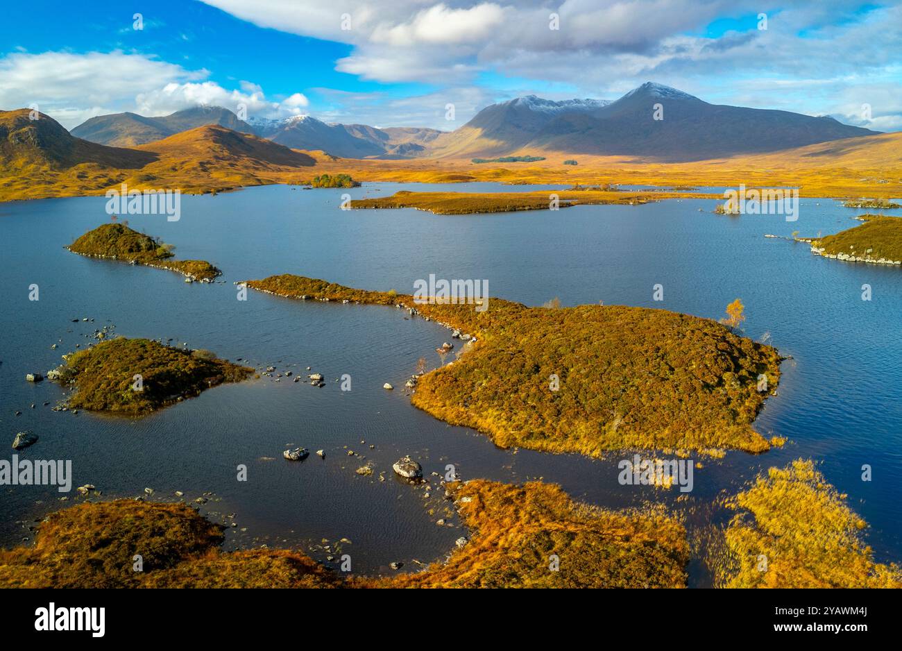 Aerial view from drone of small islands in autumn foliage on Lochan na ...