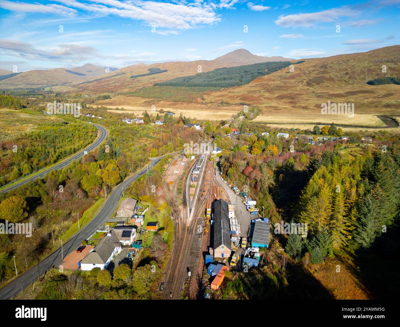 Aerial view from drone of railway station at Crianlarich village ...