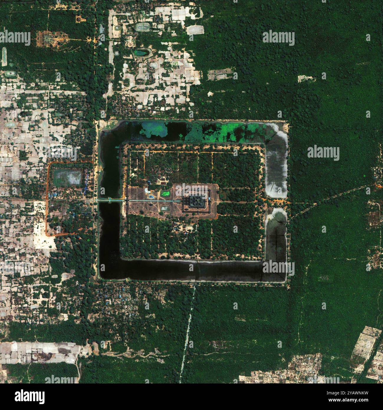 Tucked deep in the Cambodian rainforest, the ancient Angkor Wat temple ...