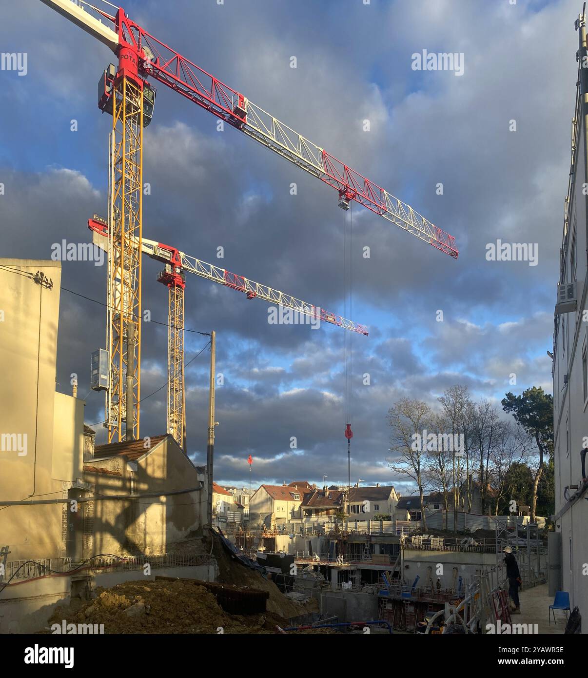 France. Saint-Leu-la-Foret. Construction of a group of buildings in the heart of the old village ...