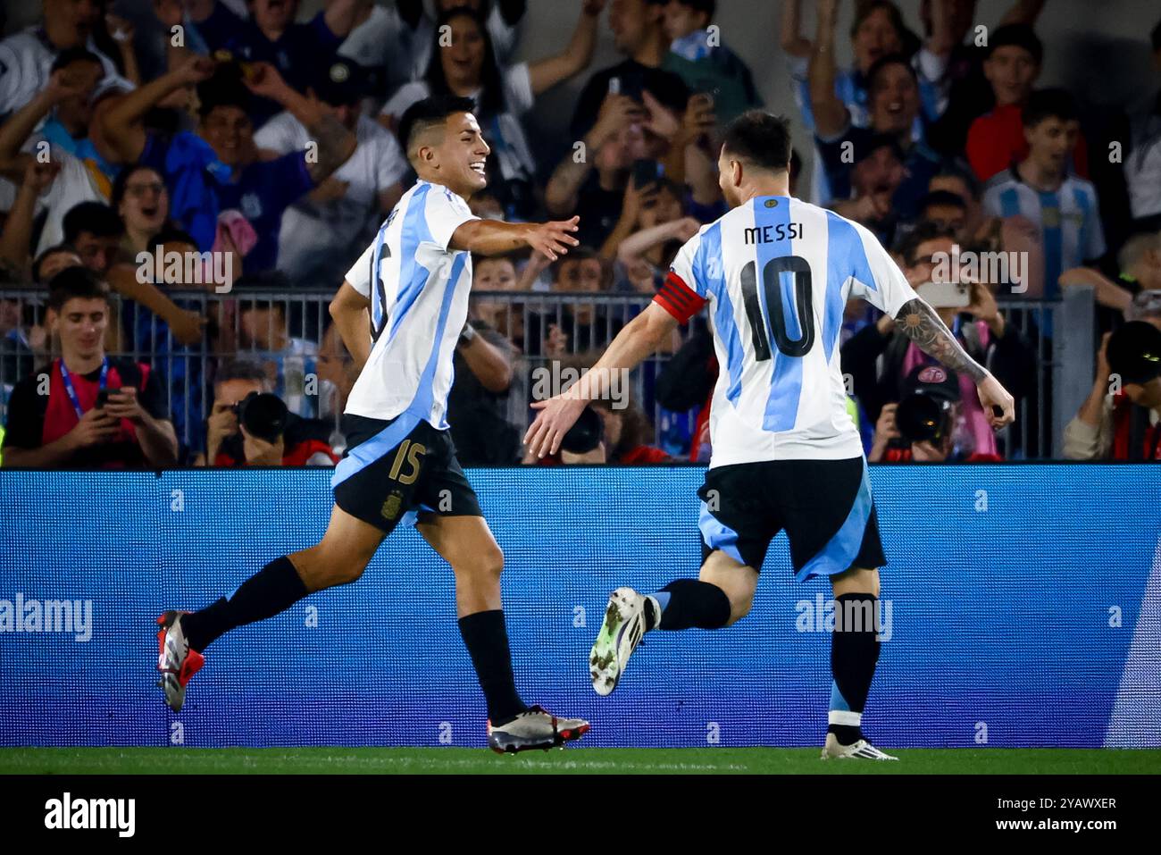 Buenos Aires, Argentina. 15th Oct, 2024. Thiago Almada (L) and Lionel Messi (R) of Argentina ...