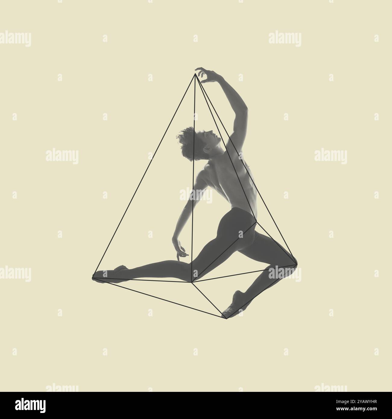 Male ballet dancer leaping with power, suspended in geometric shapes ...