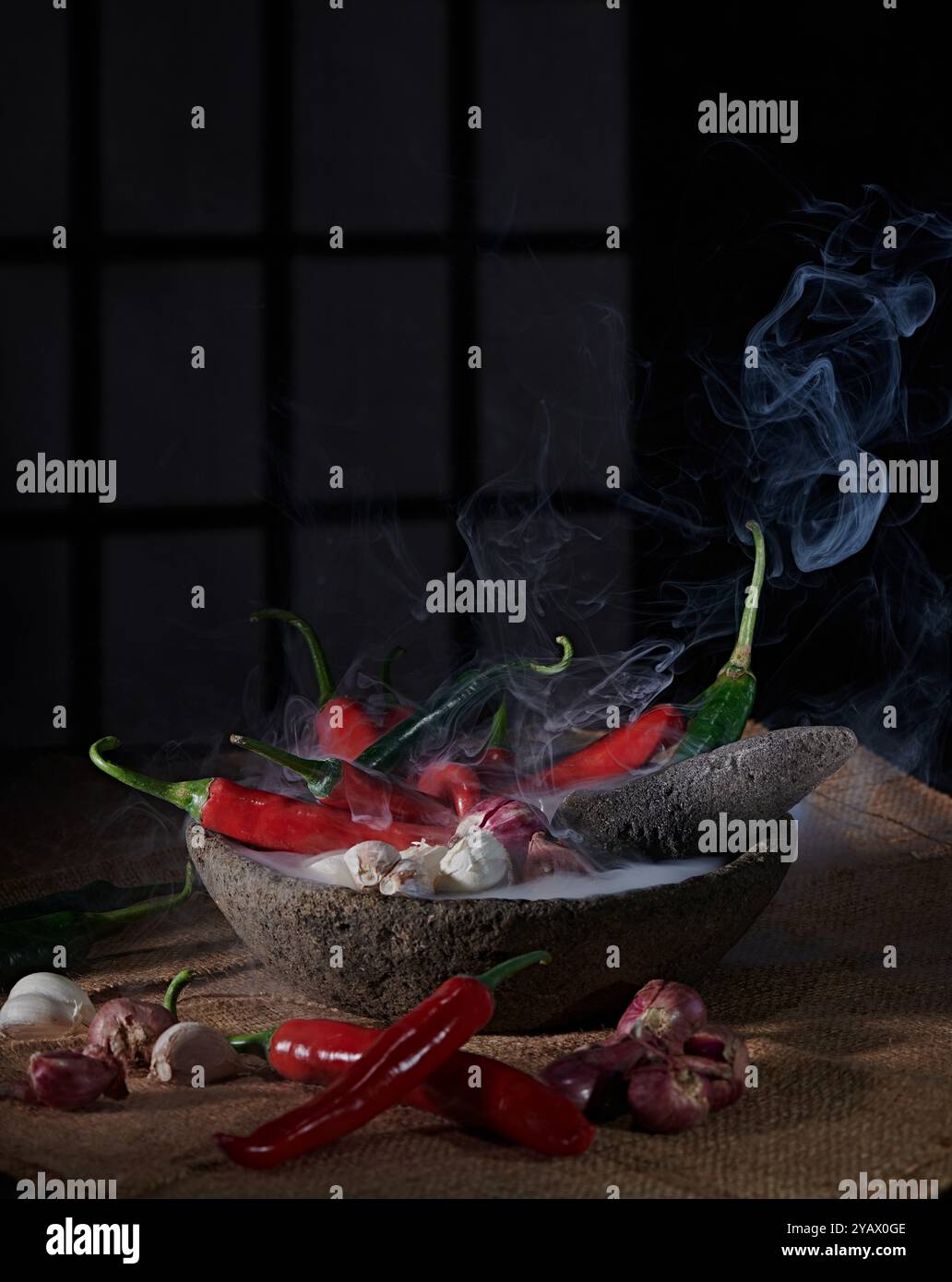 Photo of chili with dark window background Stock Photo - Alamy