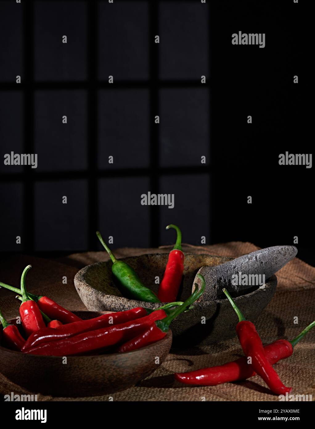 Photo of chili with dark window background Stock Photo - Alamy