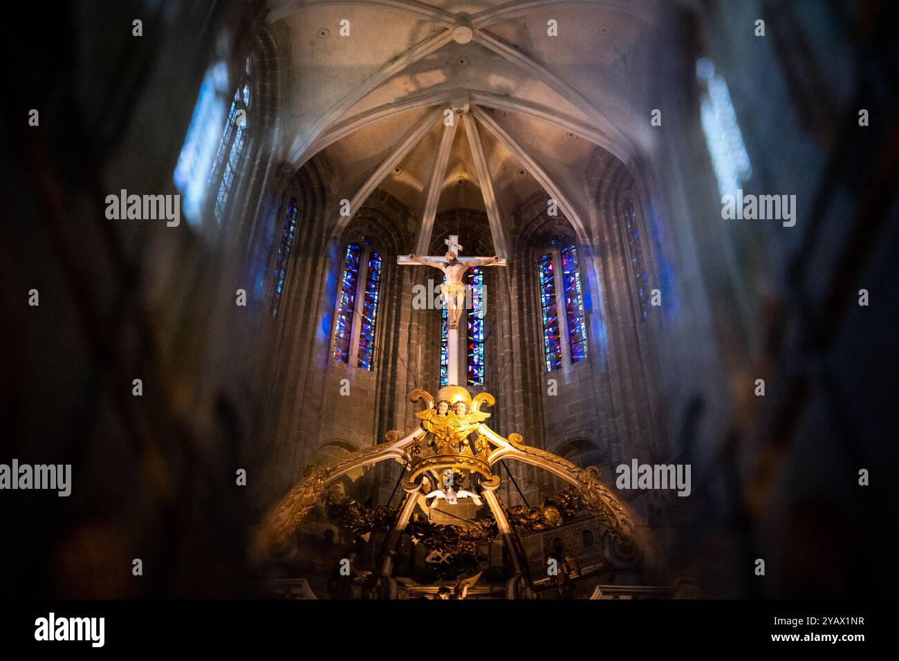 Altar with a large crucifix with Jesus on the cross in the Basilica of ...