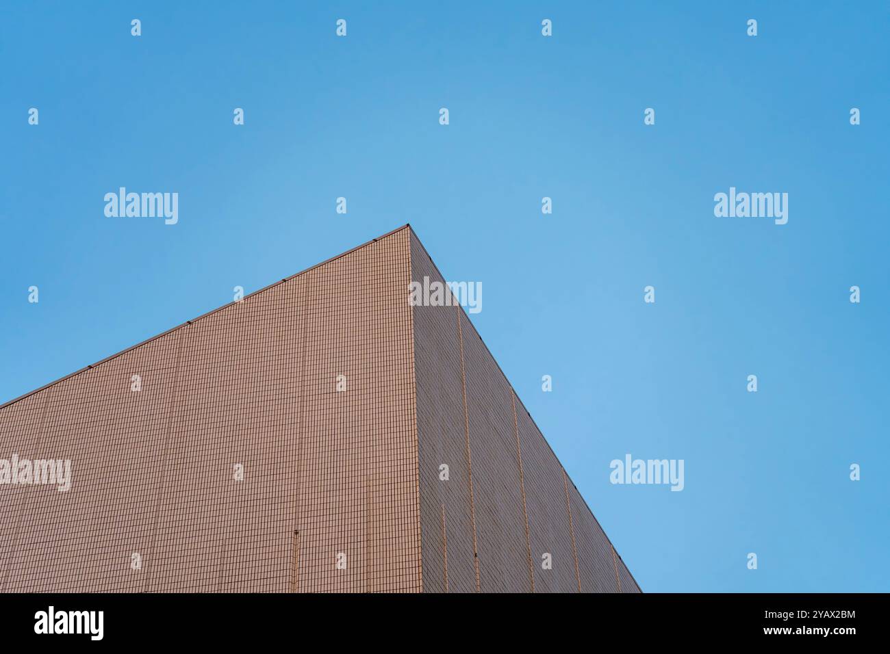 Modern of corner building with blue sky background in Hong Kong Stock ...