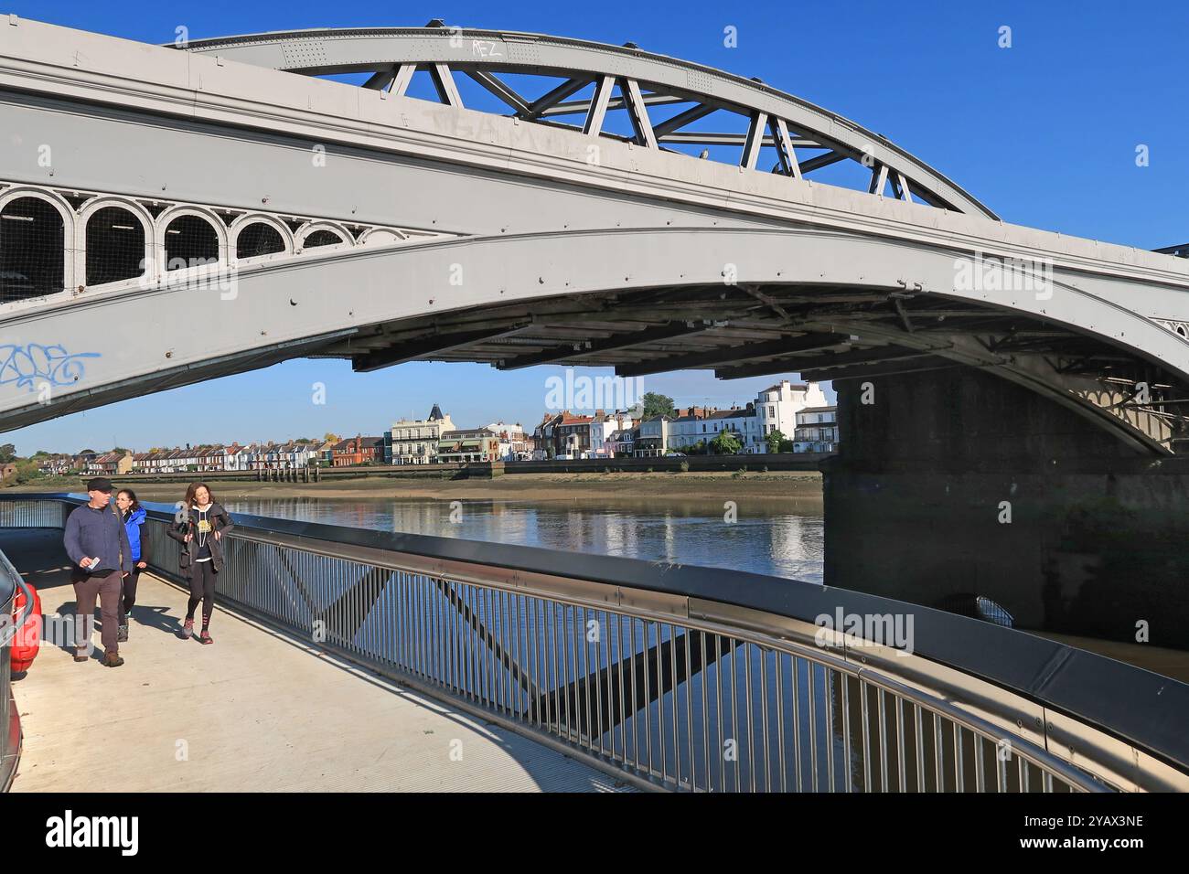 Walkers on the new Dukes meadows footbridge, Chiswick, London, UK ...