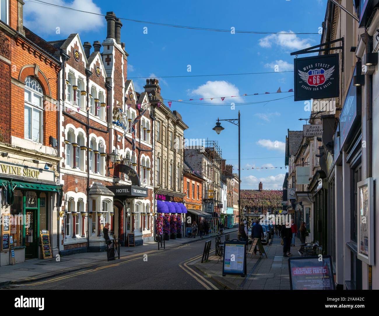 Historic buildings the Kings Arms Hotel and shops in Wood Street, Old ...