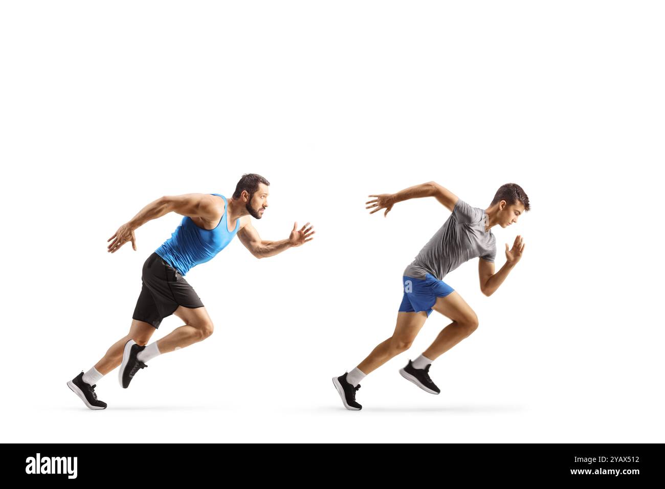 Full length profile shot of a fit male athletes running fast isolated ...