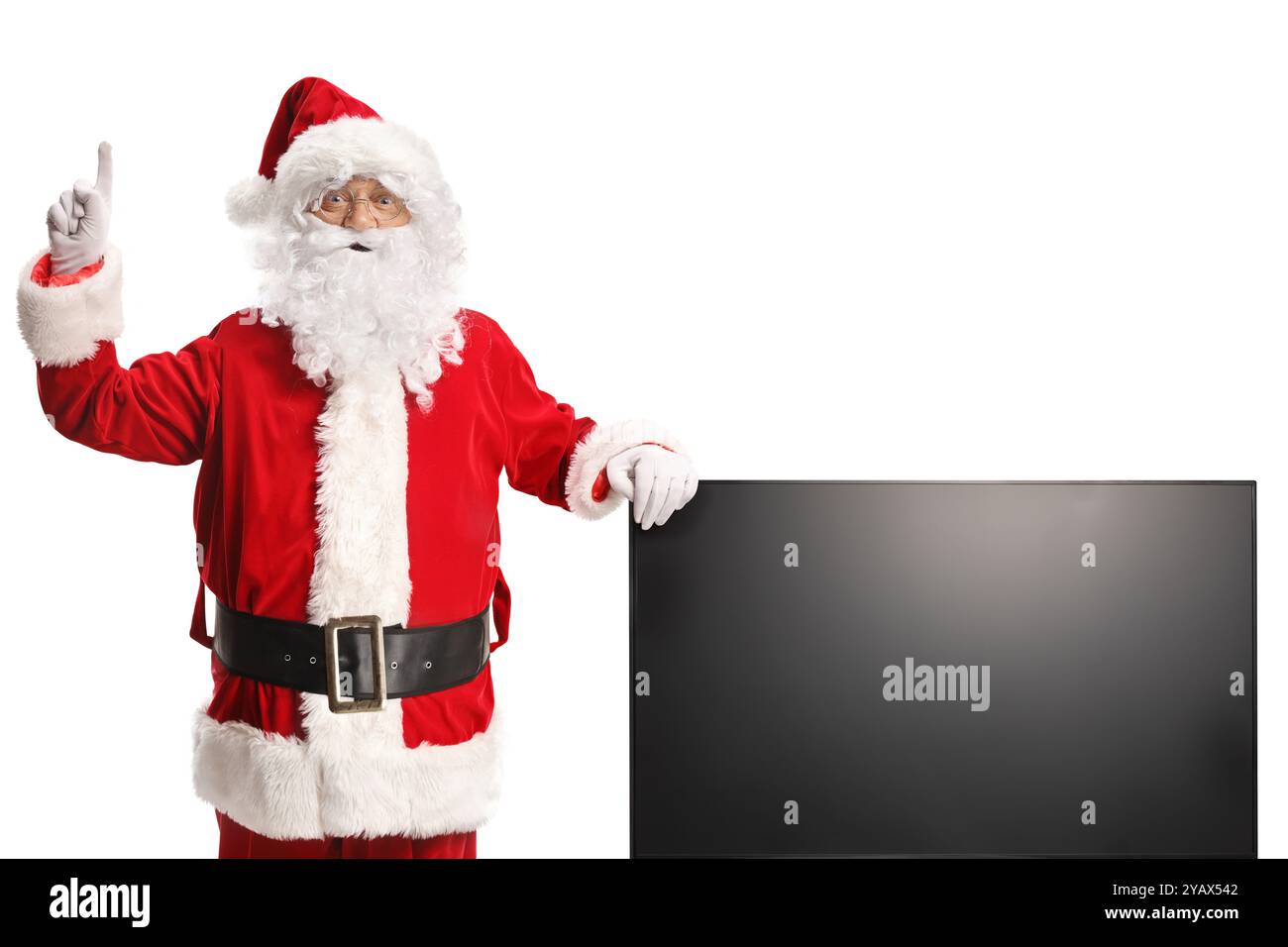 Santa claus leaning on a tv screen and pointing up isolated on white ...