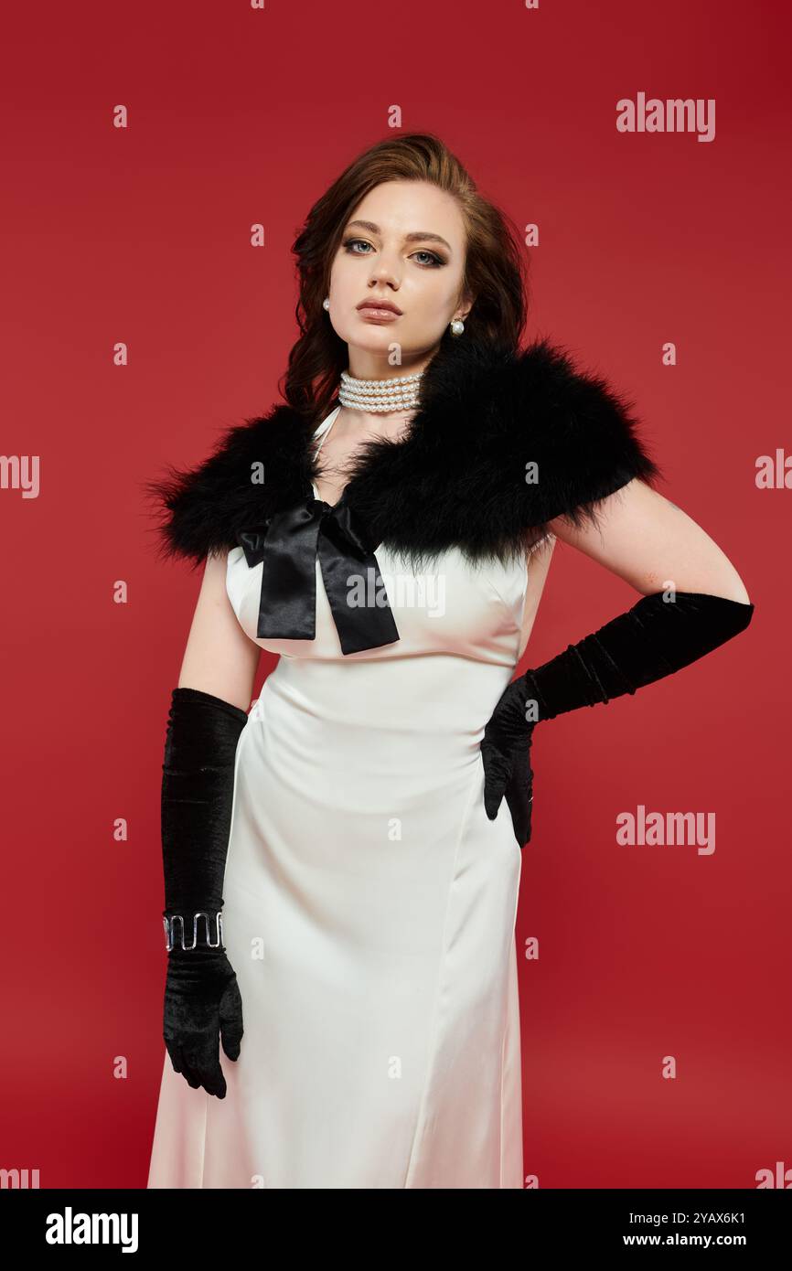 A stunning woman dressed in an elegant gown showcases her poise and ...