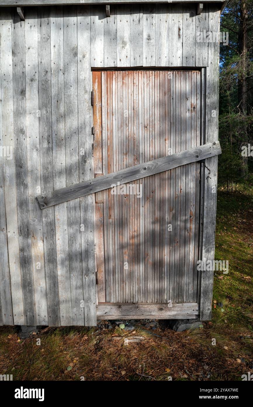 board nailed over closed wooden shack door Stock Photo - Alamy