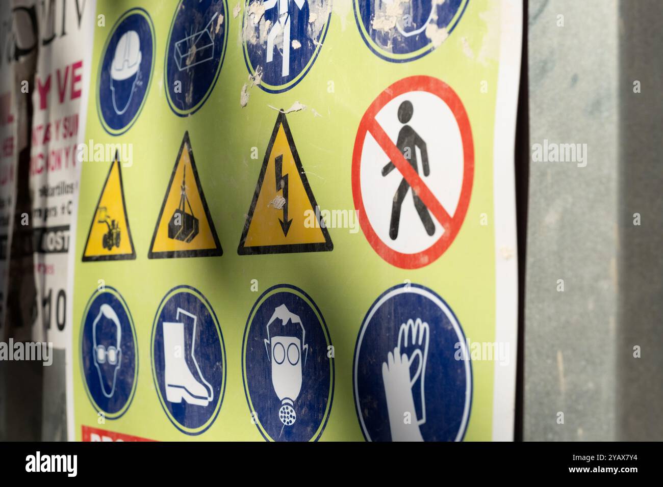 a poster with building signs of caution Stock Photo - Alamy