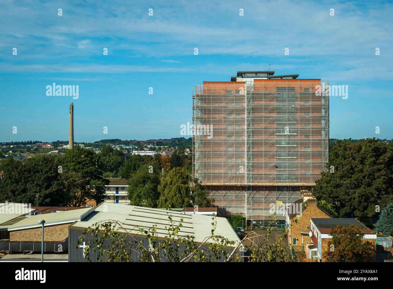 Scaffold sheeting net wrapped apartments building during insulation in ...