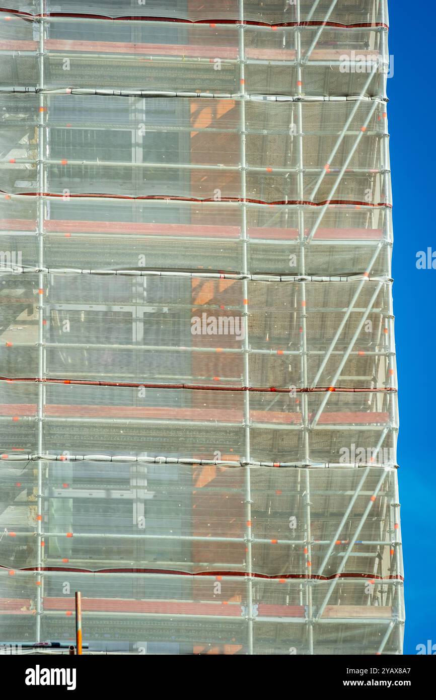 Scaffold sheeting net wrapped apartments building during insulation in ...