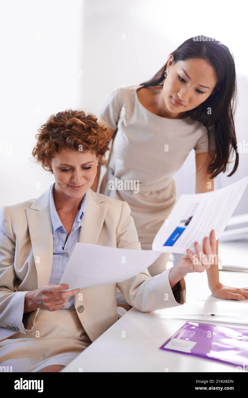 Teamwork, documents and planning with business people in office for ...