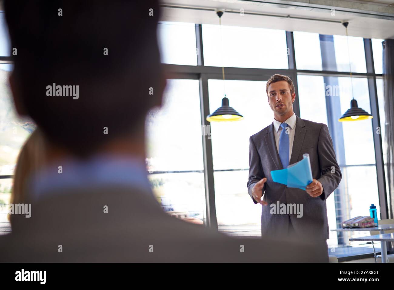 Meeting, speaker and man with business people in conference, tradeshow ...