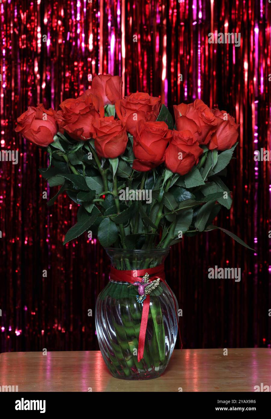 Bouquet of Long Stem Orange Roses in Glass Vase Stock Photo - Alamy