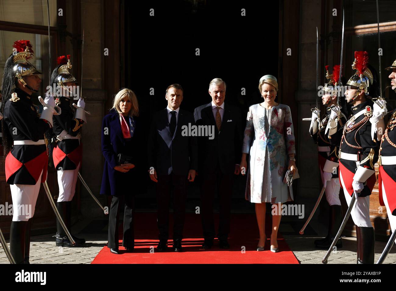 French President Emmanuel Macron, center left, his wife Brigitte, left ...