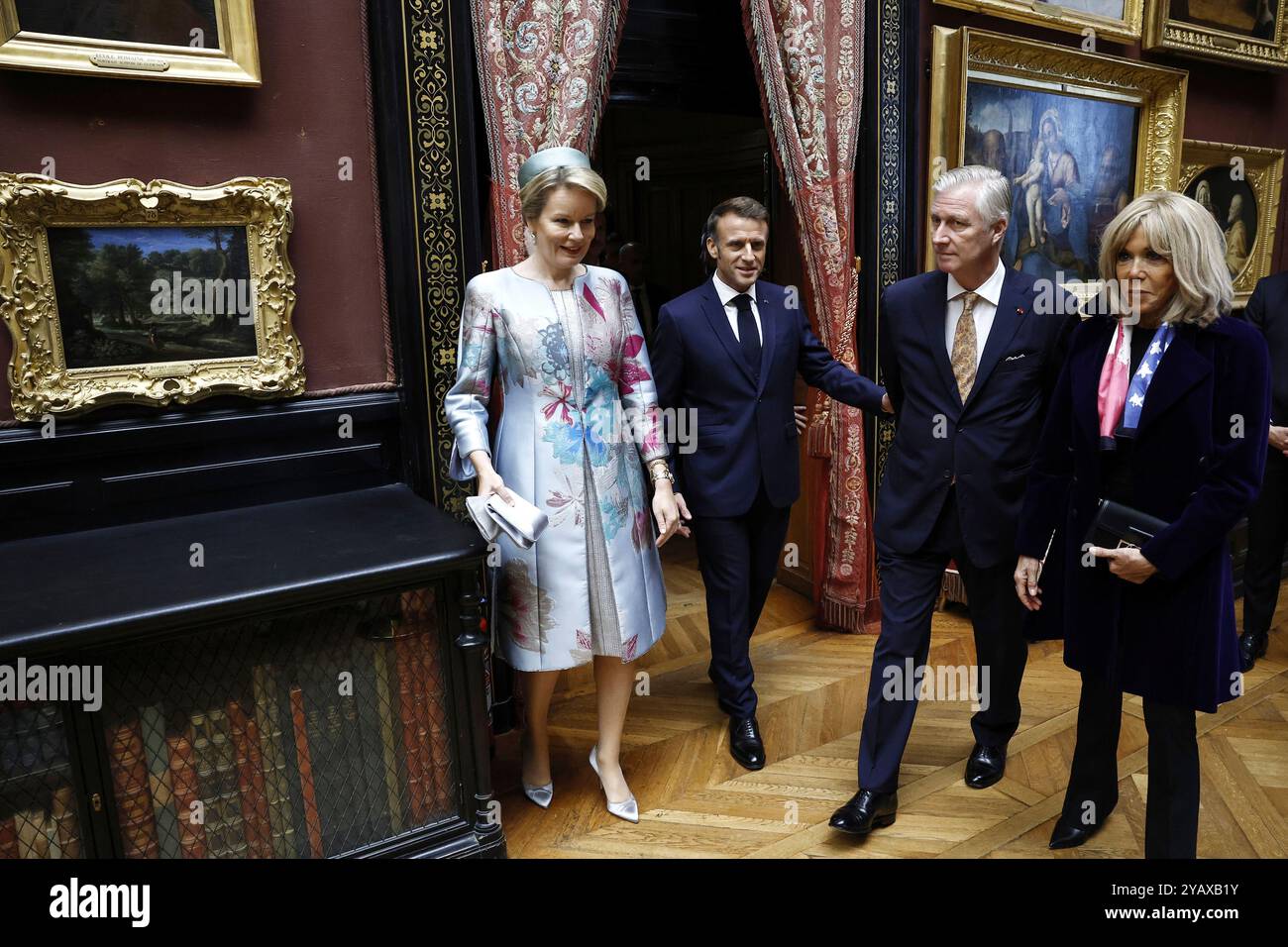 French President Emmanuel Macron, center, his wife Brigitte, right ...