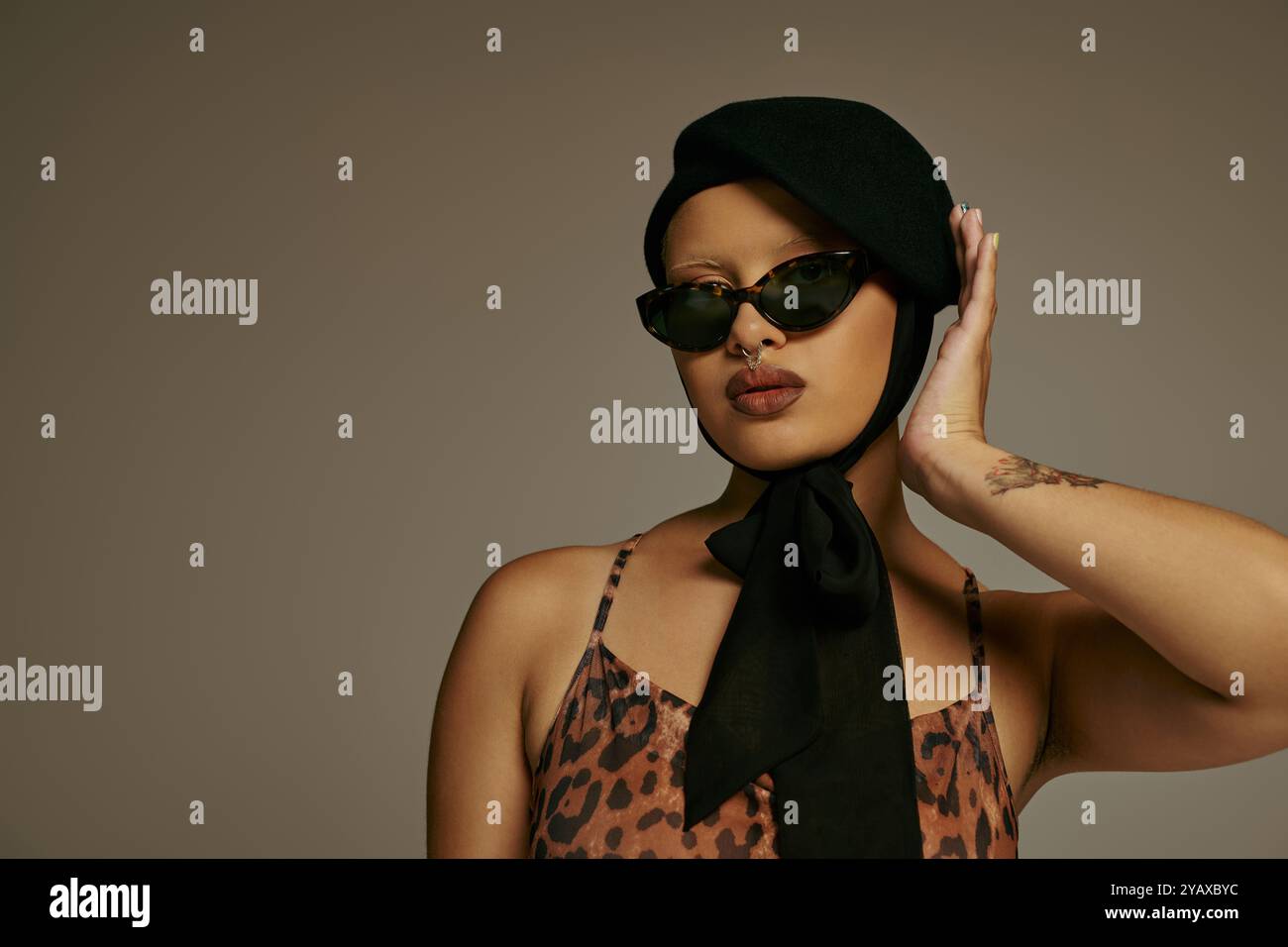 A young woman captivates with elegant style and bold accessories Stock ...