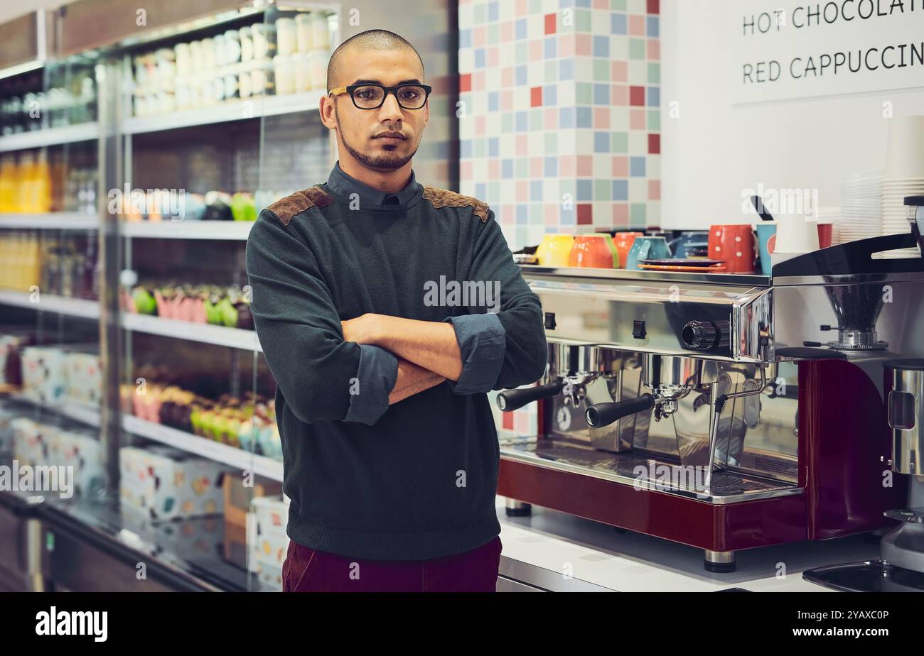 Arms crossed, barista and portrait of man in coffee shop for management ...