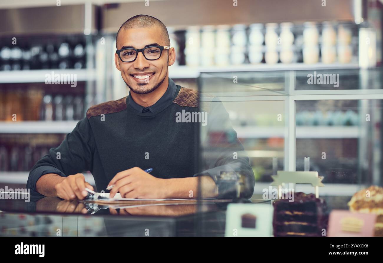Business owner, portrait and writing on clipboard at cafe with stock ...