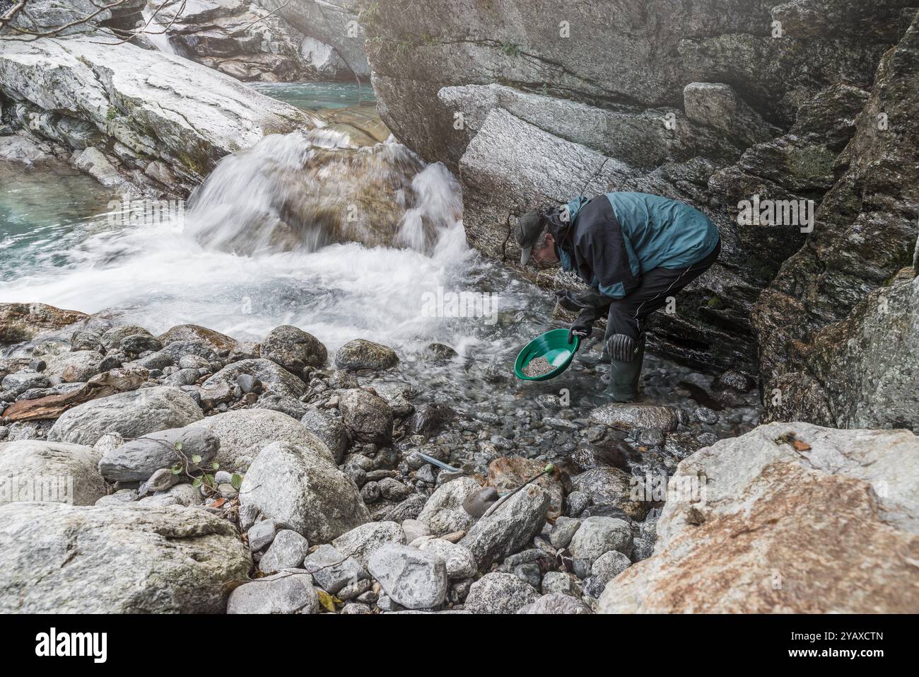 Hand adult person gold panning hi-res stock photography and images - Alamy