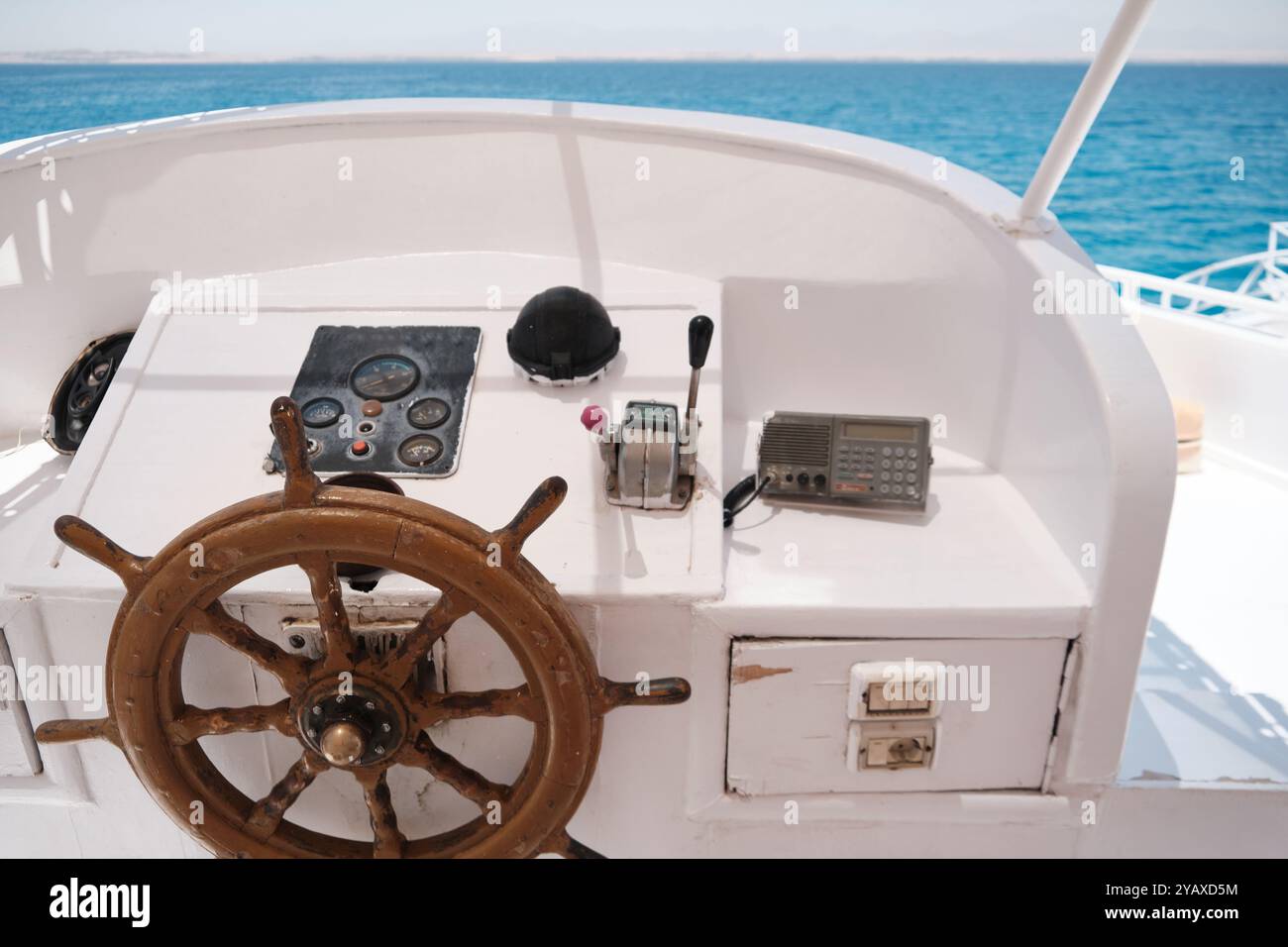 Wooden helm of yacht in the sea Stock Photo - Alamy