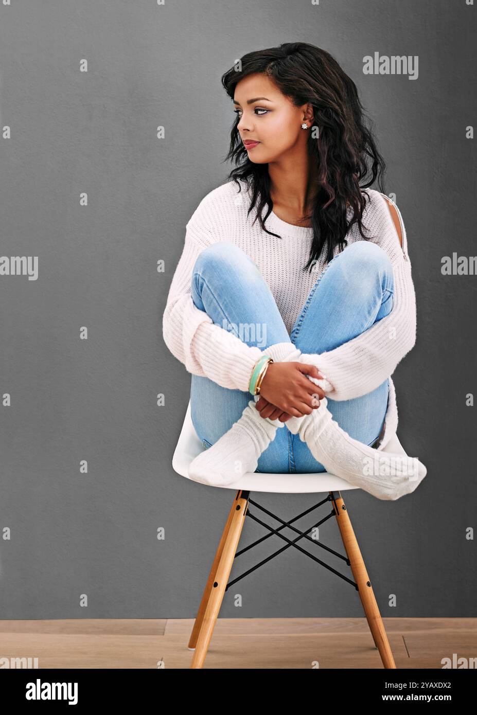 Thinking, relax and woman on chair, decision and daydreaming on gray ...