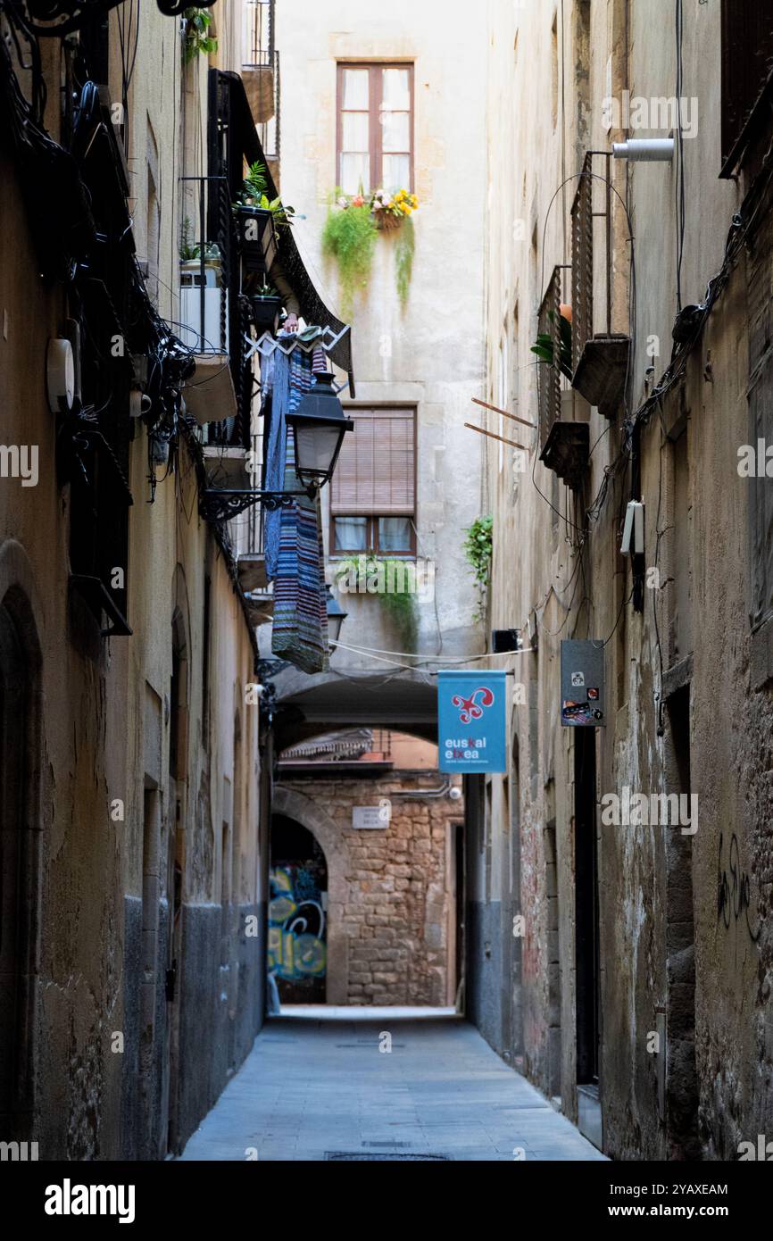 Small alley in Barcelona Stock Photo - Alamy
