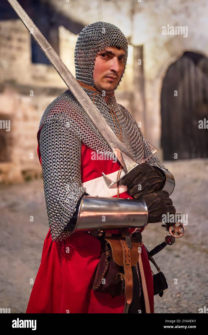 A member of the Rhodes Medieval Rose Association Knights' Swords Team ...