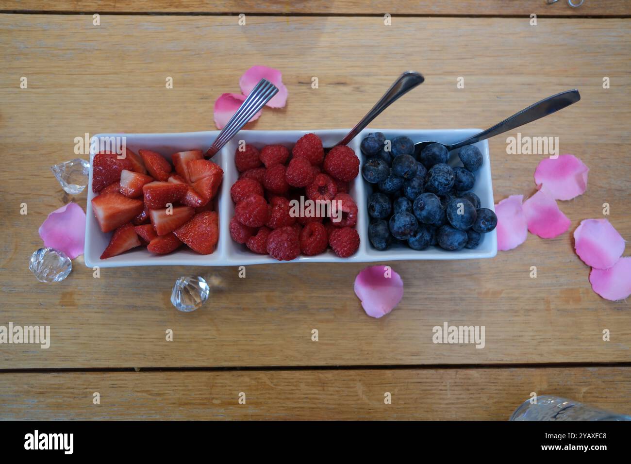 A birthday party celebration table layout with hats and fruit Stock ...