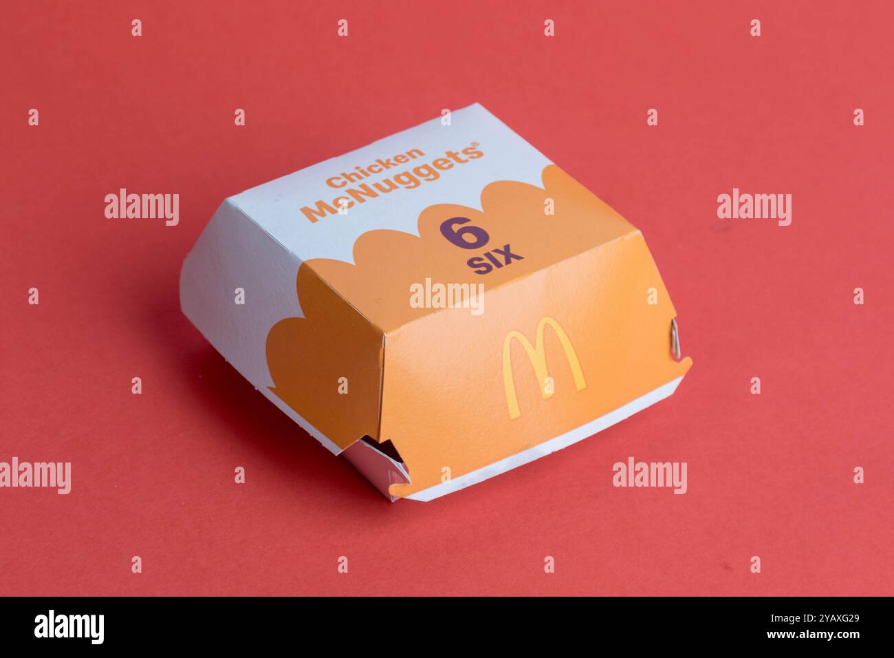London, United Kingdom, 14th October 2024:- A view of a McDonalds 6 Chicken McNuggets, against a ...