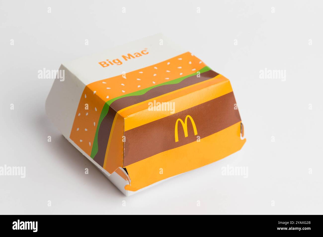 London, United Kingdom, 14th October 2024:- A view of a McDonalds Big Mac Box, against a white ...