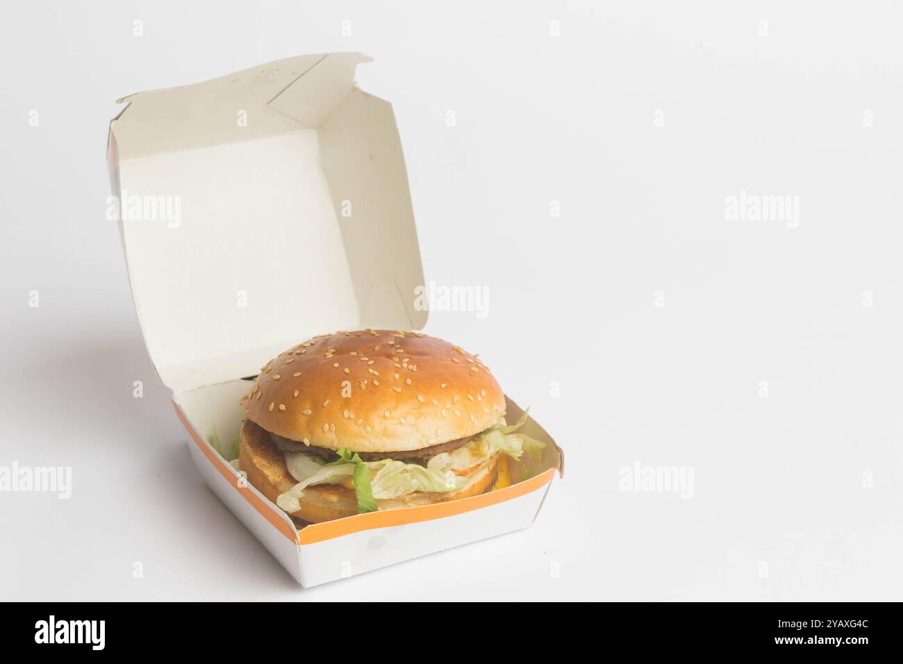 London, United Kingdom, 14th October 2024:- A view of a McDonalds Big Mac, against a white ...