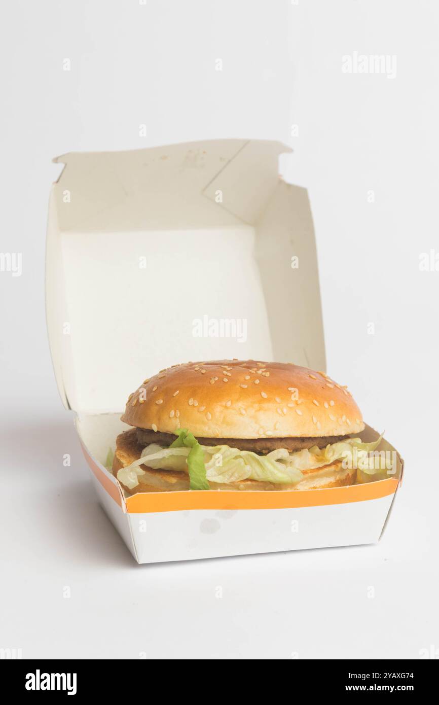 London, United Kingdom, 14th October 2024:- A view of a McDonalds Big Mac, against a white ...