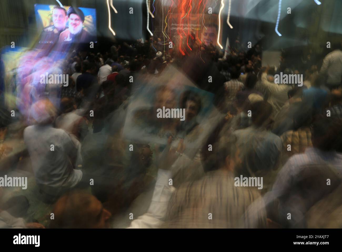 Tehran, Iran. 15th Oct, 2024. Mourners attend the funeral ceremony of ...