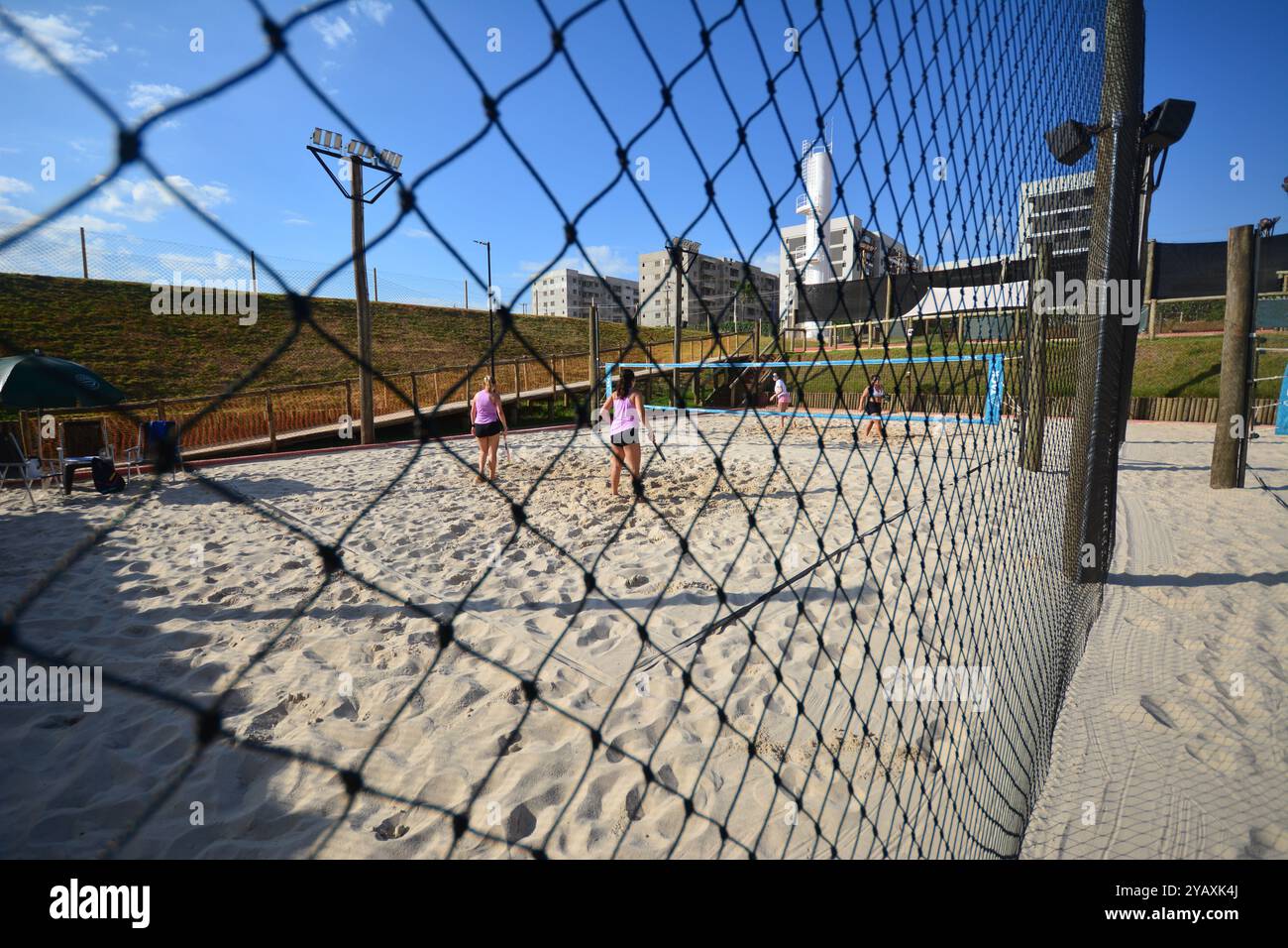 Athletes playing in beach tennis competition Stock Photo - Alamy