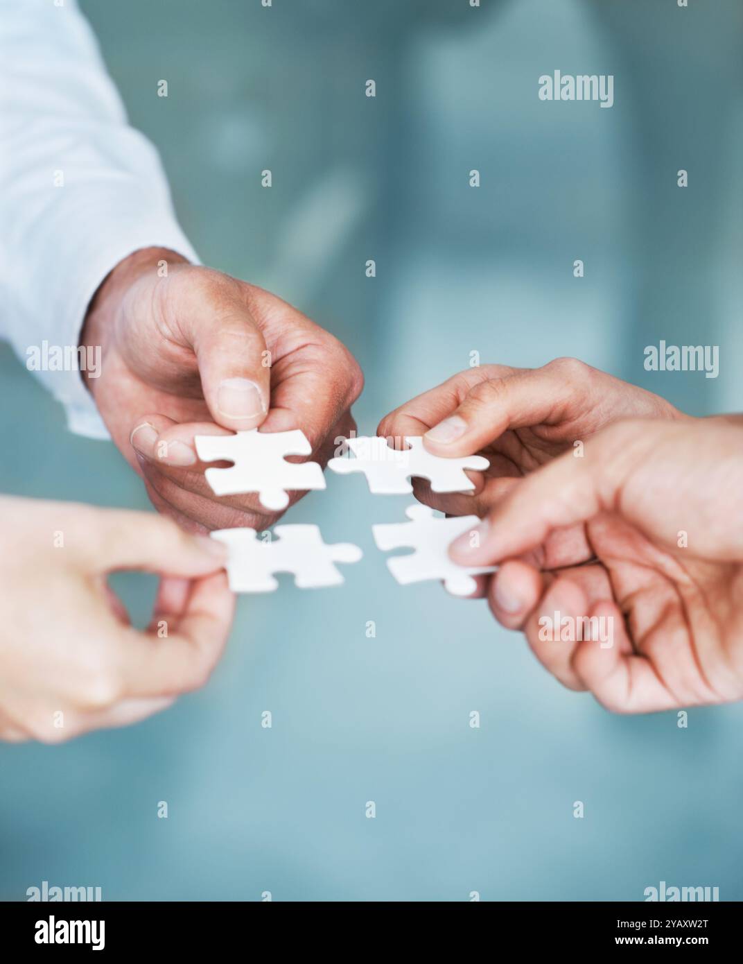 Business people, team building and hands with puzzle for problem ...